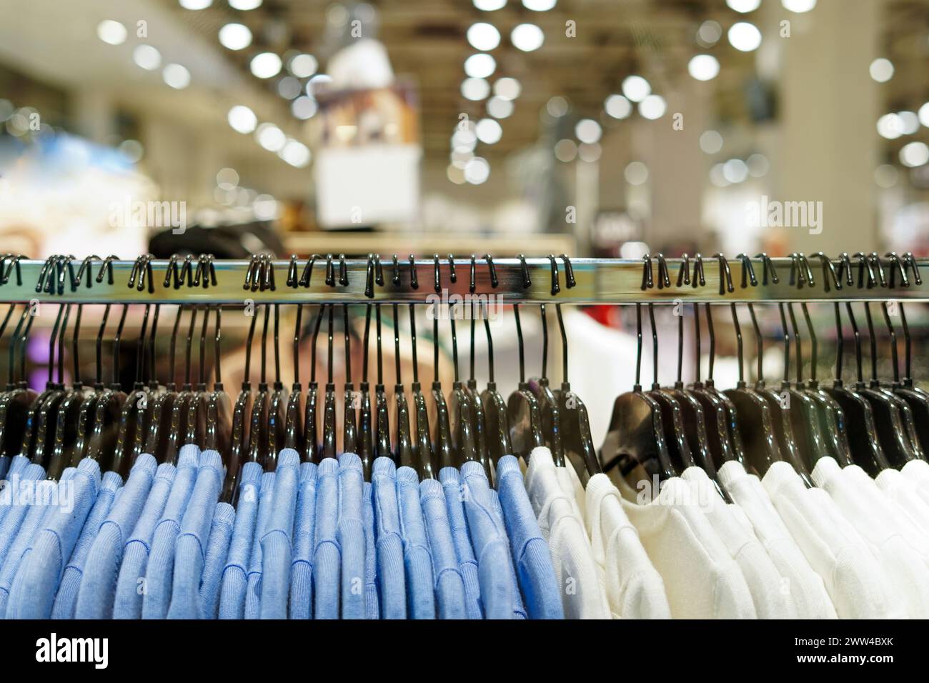 Fashion clothing on hangers at the show hi-res stock photography and ...