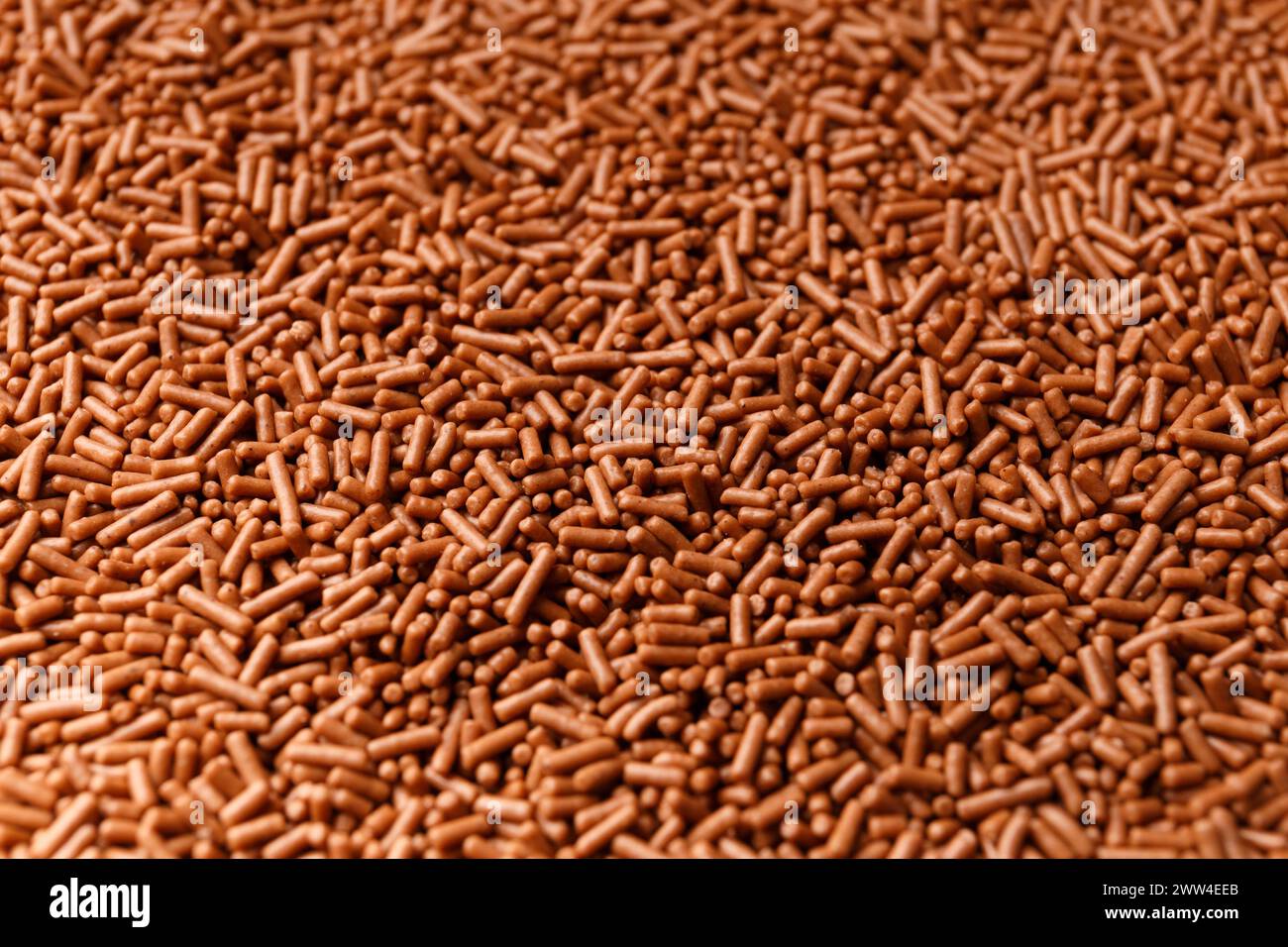 Chocolate chip background close-up, milk chocolate chip as abstract ...