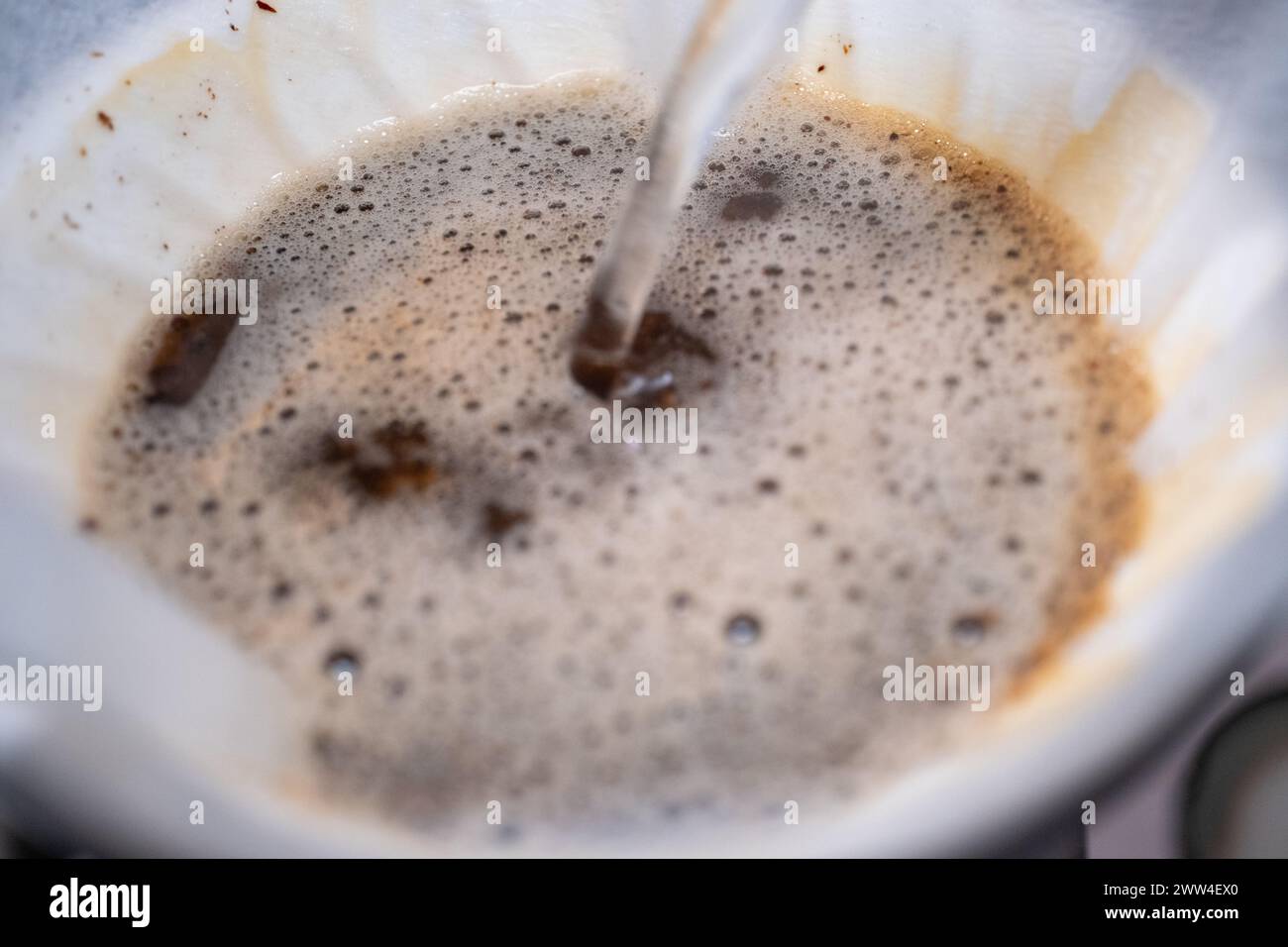 Brewing coffee with the v60 method Stock Photo - Alamy