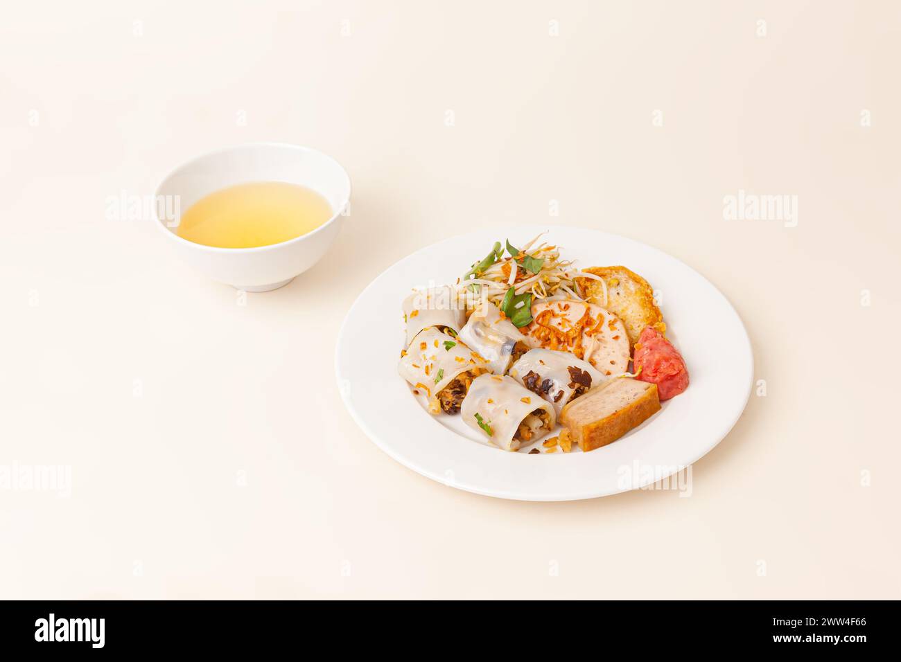 Banh Cuon, Vietnamese steamed rice rolls pancake with savory mixture of ...