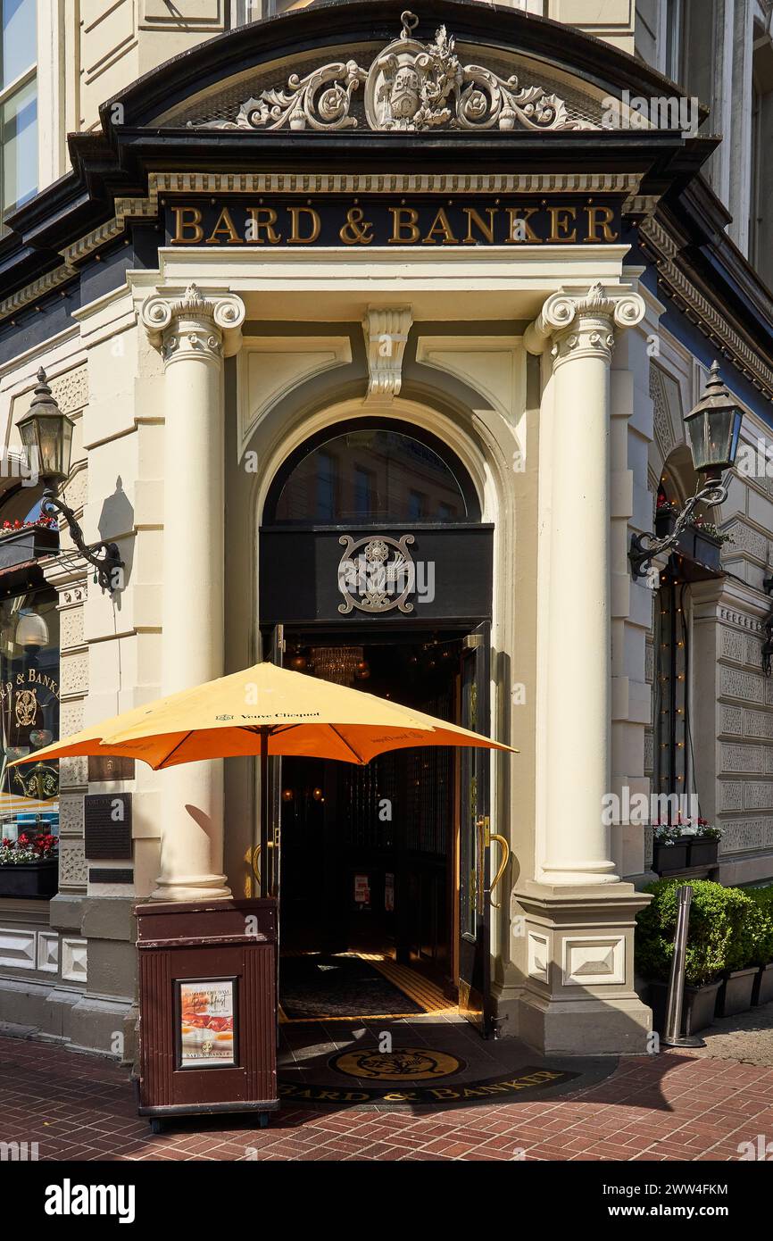 The ornate entrance of a historic building that is now the Bard and ...
