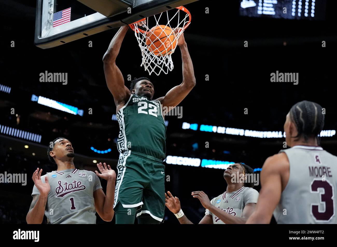 Michigan State center Mady Sissoko scores over Mississippi State forward Tolu Smith during the ...