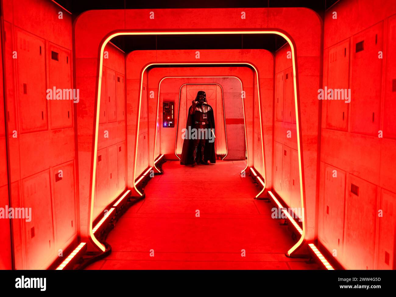 A Darth Vader costumed character poses at the Hasbro and Amazon Star ...