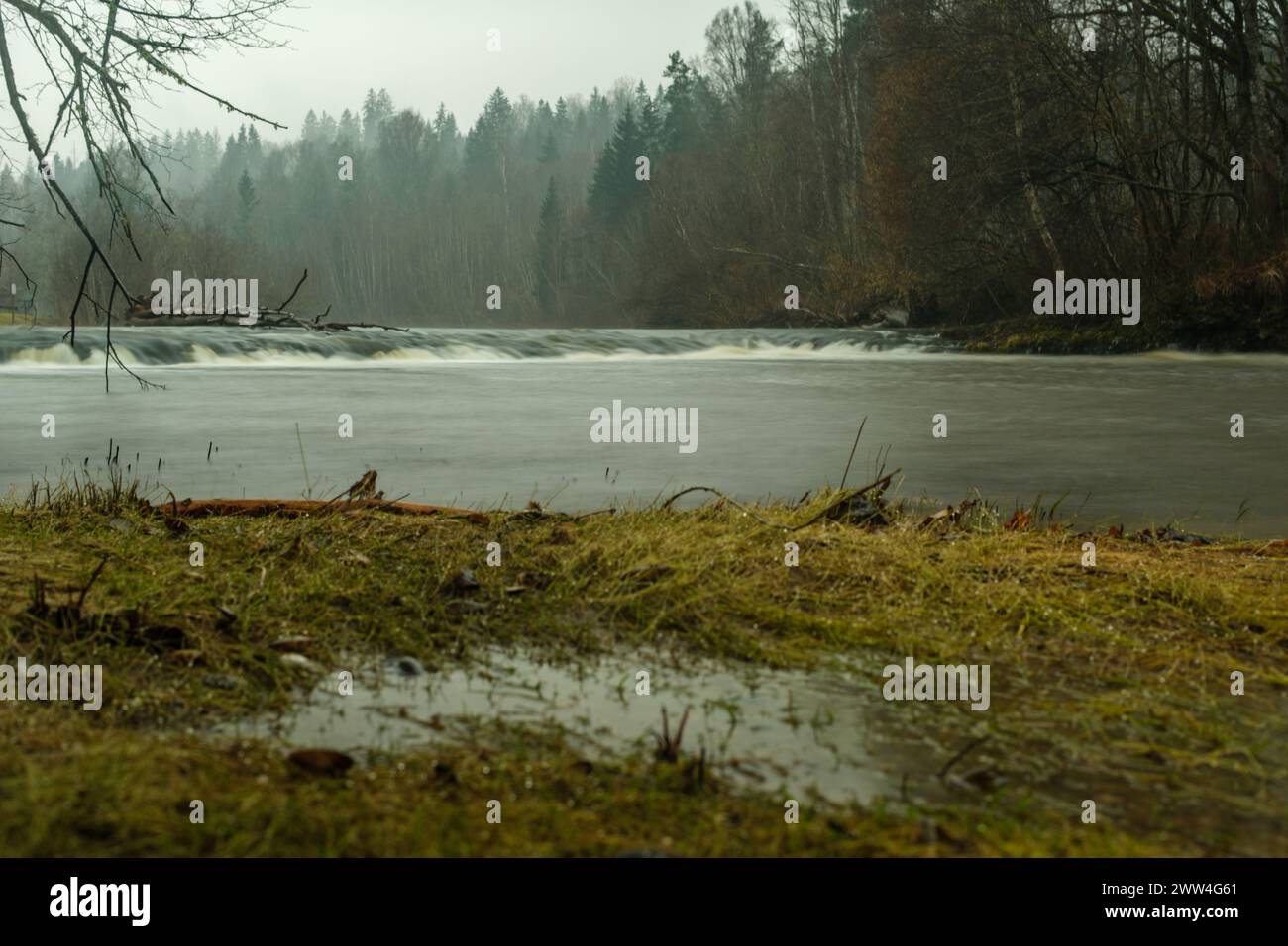 Behold the ethereal beauty of Abava Waterfall in long exposure, where ...