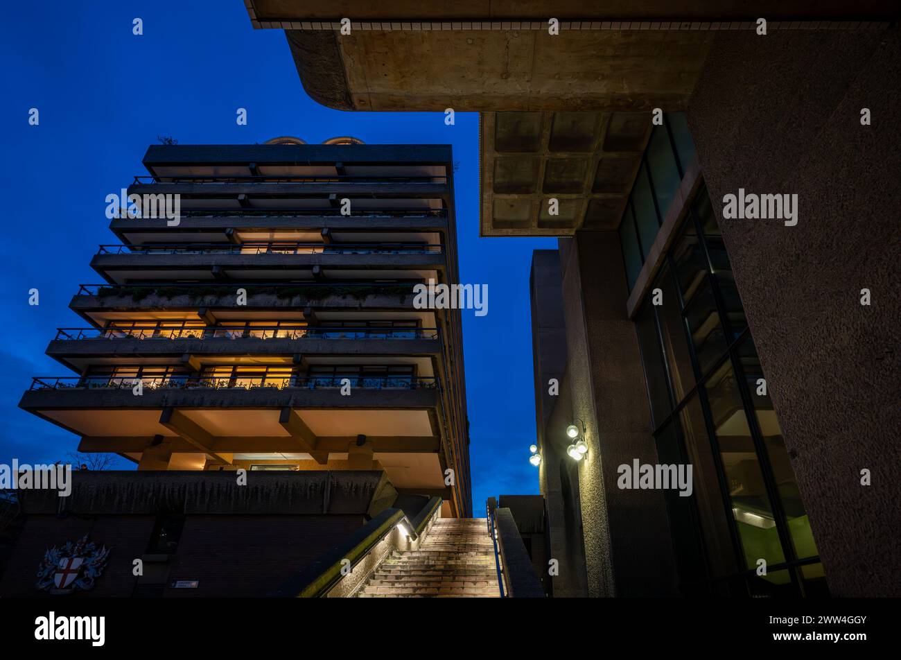 London, UK: Residential blocks with steps at night on the Barbican ...