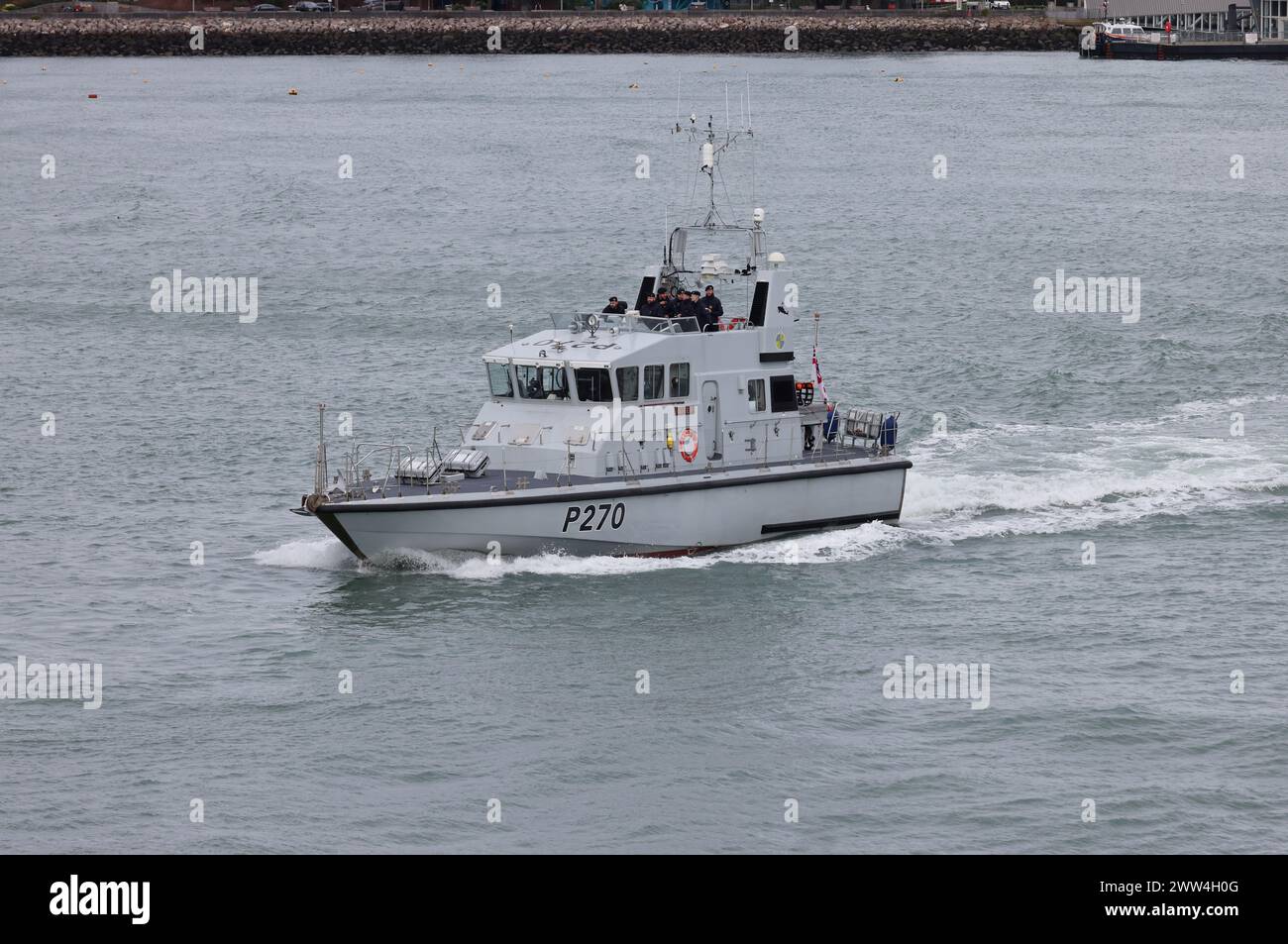 The Royal Navy patrol craft HMS BITER (P270) sails for a four month ...