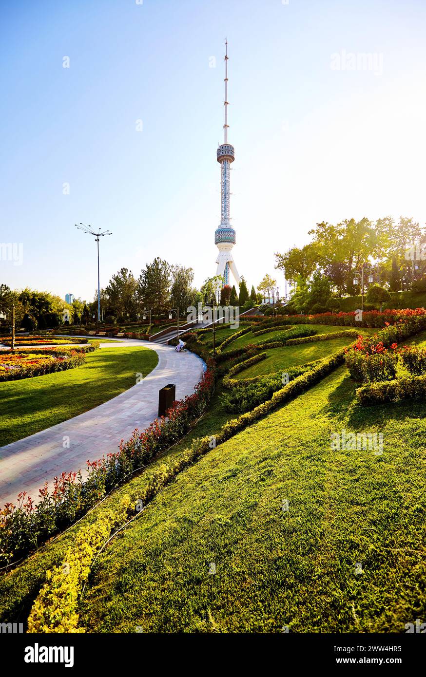 Tashkent Television TV Tower Toshkent Teleminorasi and green grass lawn ...