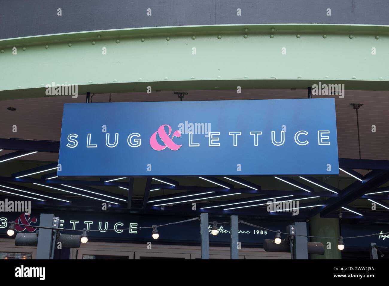 Sign above entrance to Slug and Lettuce pub and restaurant in Brindley ...