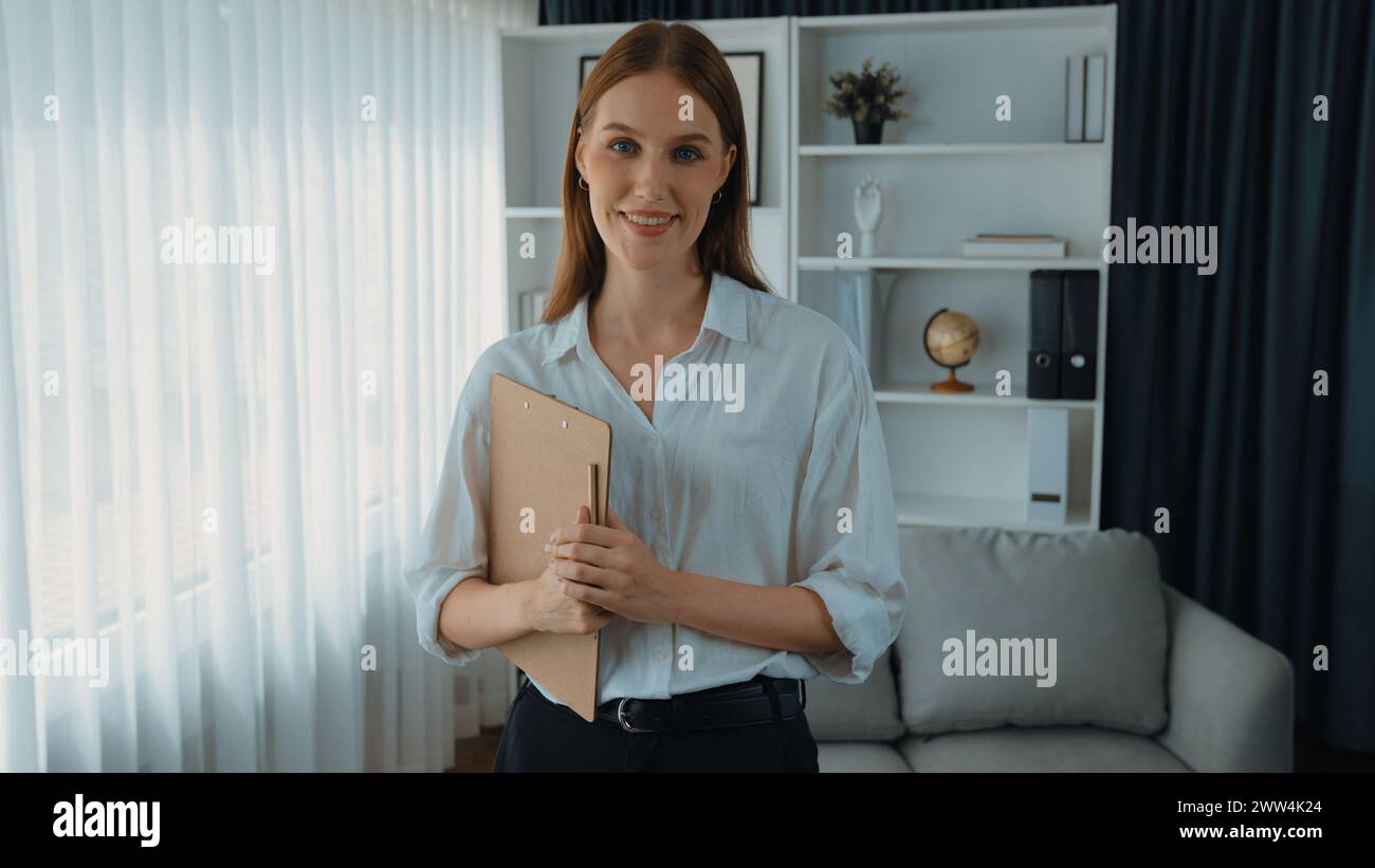 Friendly psychologist woman in clinic office professional portrait with ...