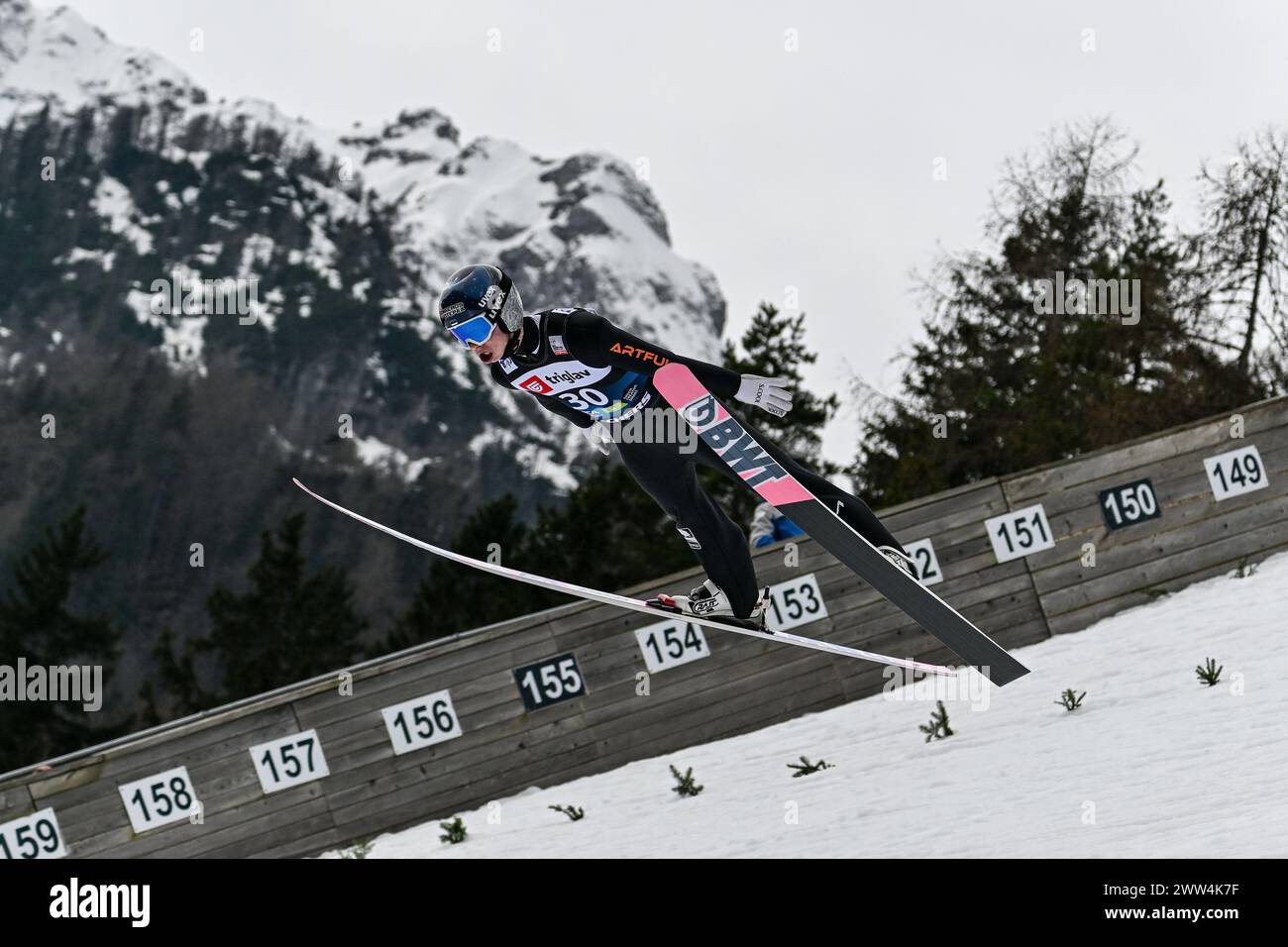 Planica, Slovenia. 21st Mar, 2024. Artti Aigro of Estonia in action ...