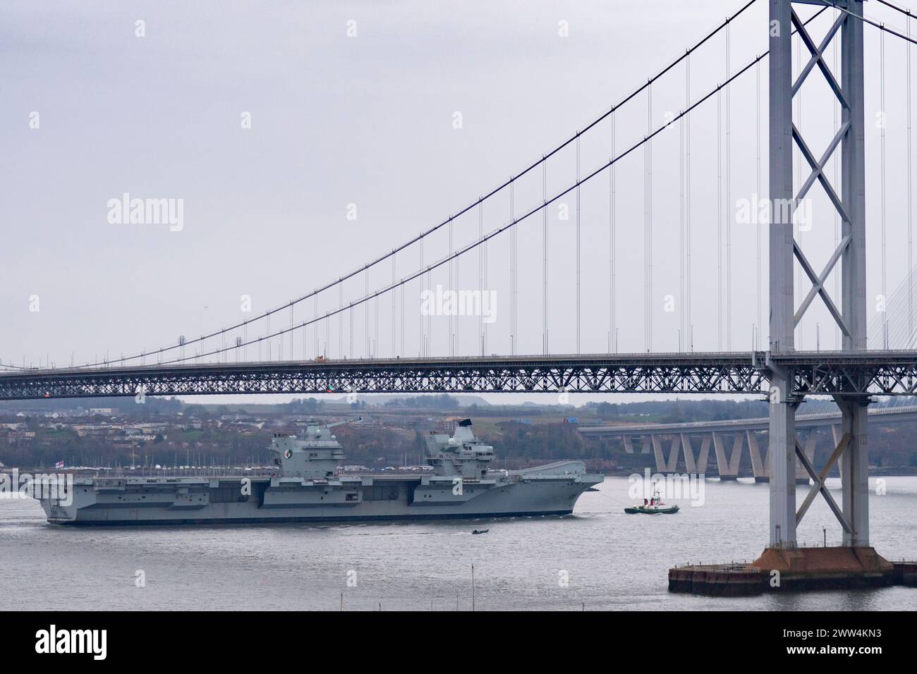 Royal Navy aircraft carrier HMS Queen Elizabeth sails under Forth Road ...