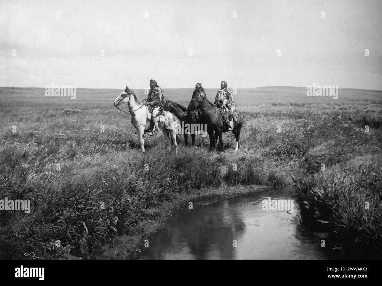 Three mounted Piegan chiefs on the prairie. Photographed by Edward S ...