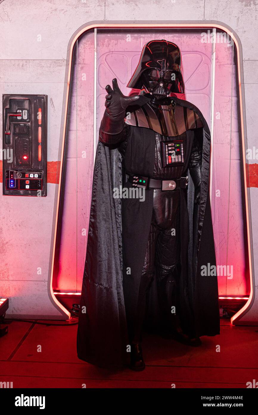 New York, USA. 21st Mar, 2024. A costumed Darth Vader character poses ...