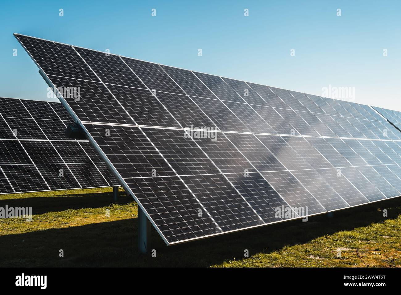 detail of solar panels in photovoltaic solar plant on bright sunny day ...
