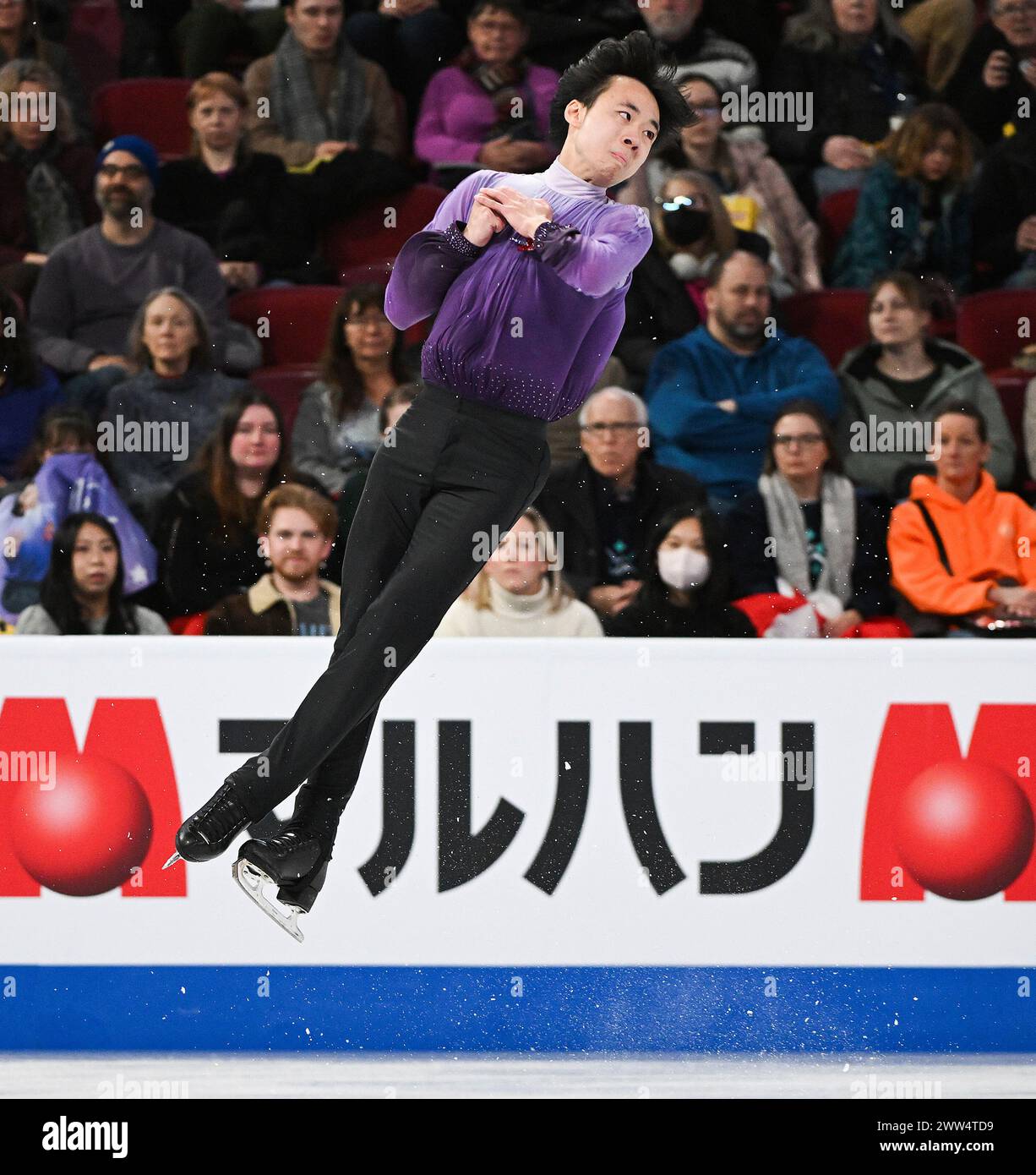 Wesley Chiu, of Canada, performs his short program in the men's ...