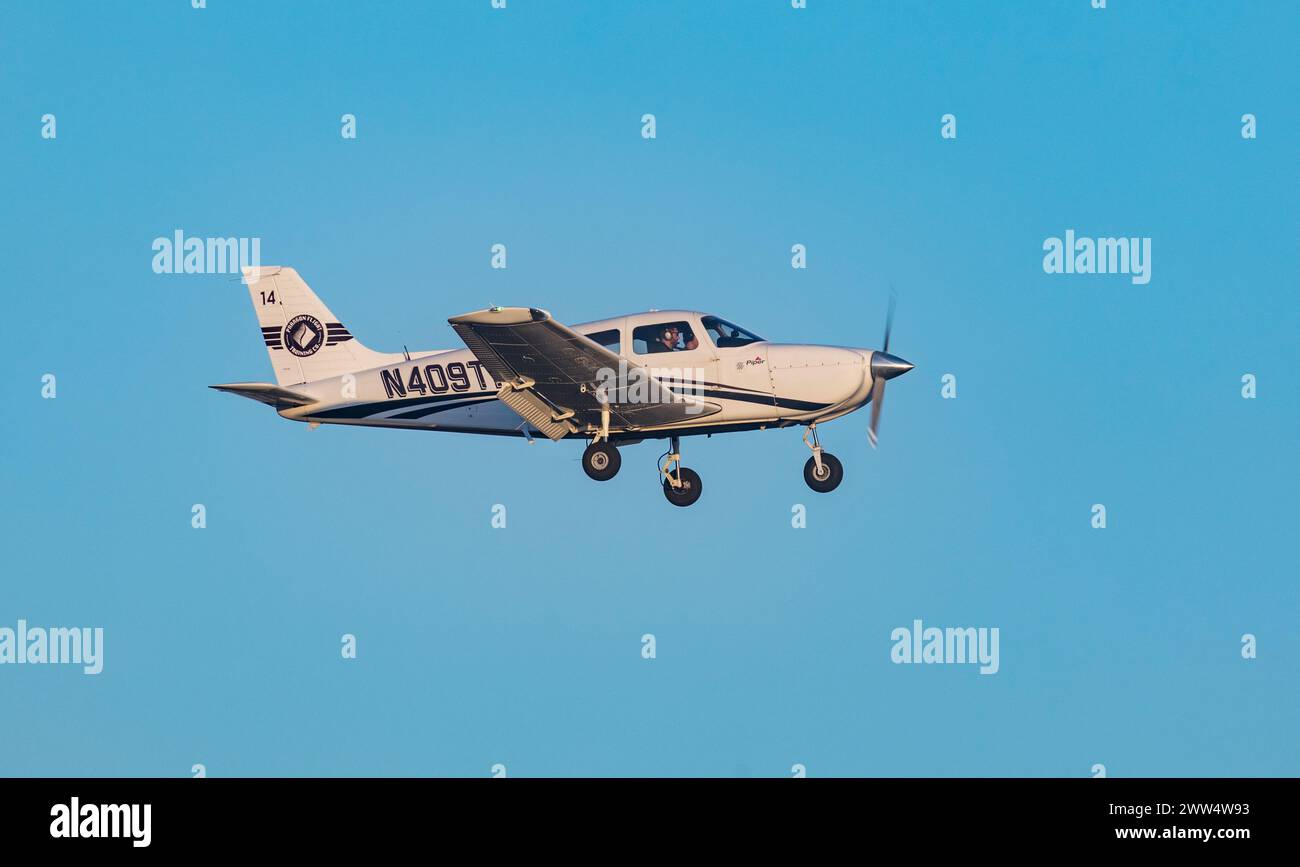 FORT MYERS, FLORIDA, USA - 15 FEB 2024. PIPER ARCHER III flies in the ...