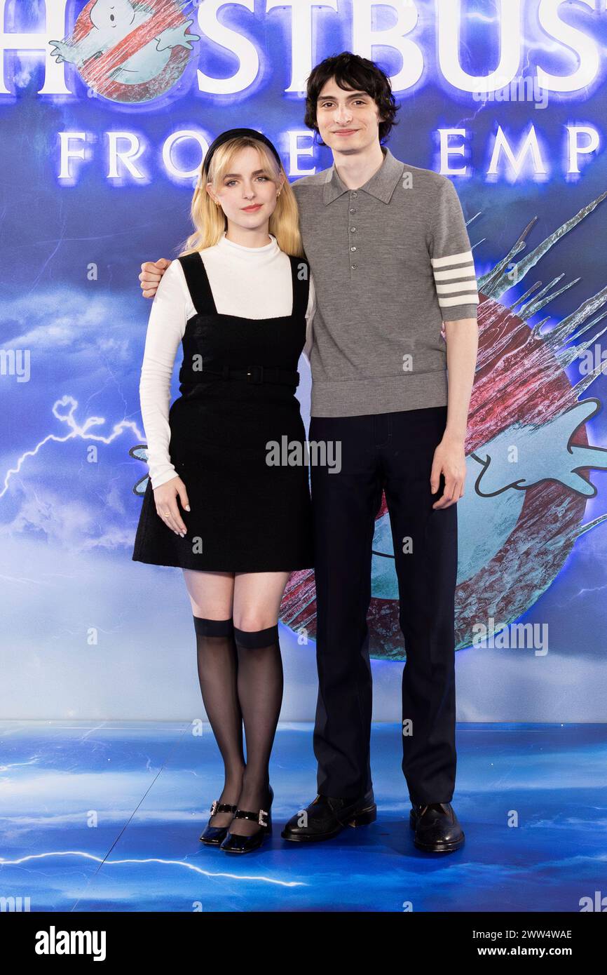 McKenna Grace, left, and Finn Wolfhard pose for photographers at the ...