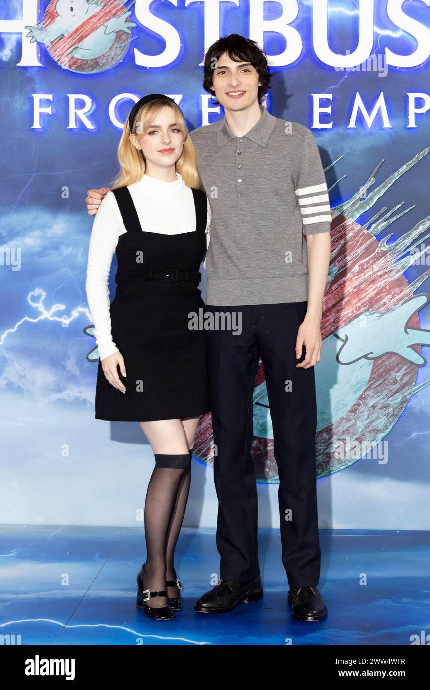 McKenna Grace, left, and Finn Wolfhard pose for photographers at the ...