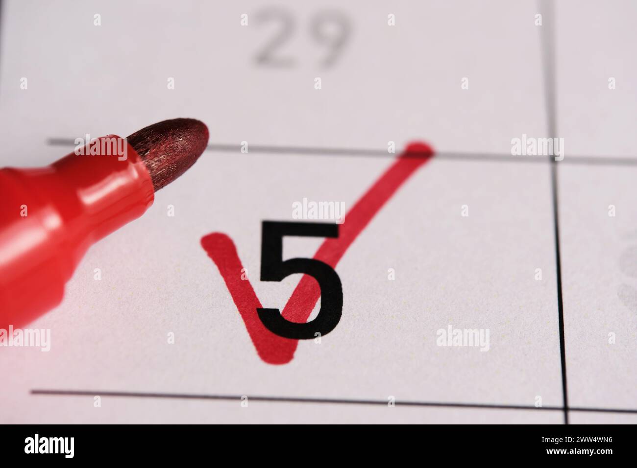 5th day in the calendar is marked with a red marker Stock Photo - Alamy