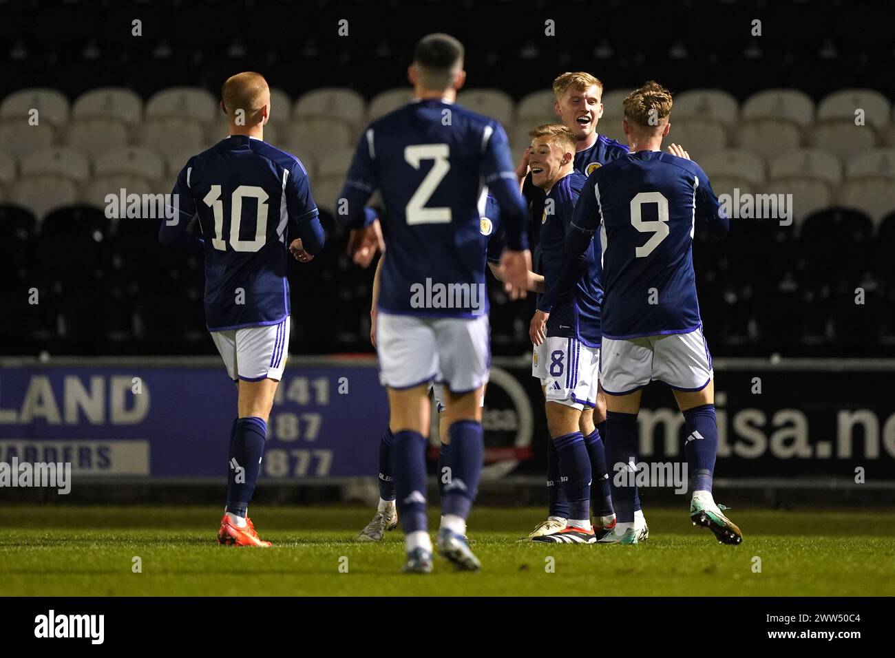 Scotland's Josh Doig (hidden) celebrates scoring their side's first ...