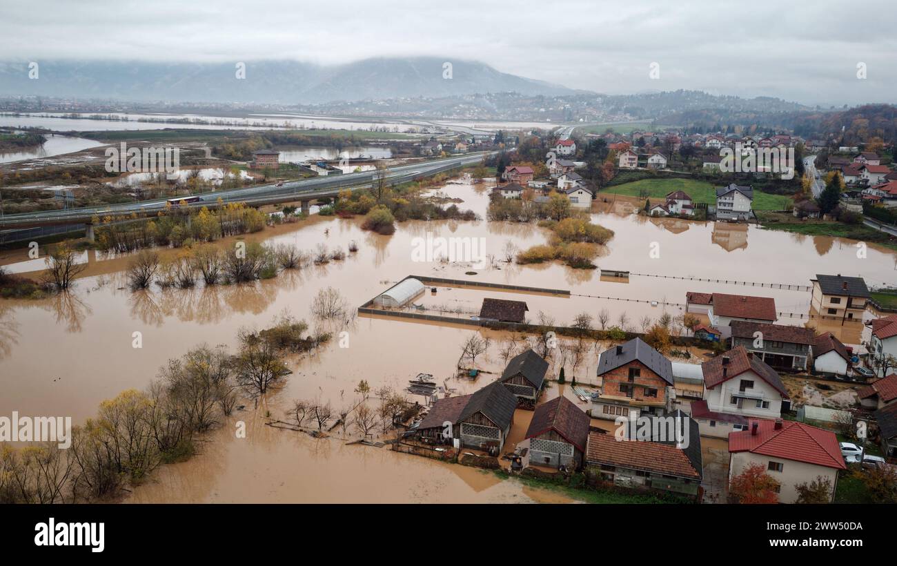 Aerial drone view of torrential rain causes flash floods in residential ...