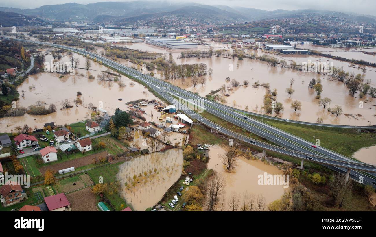 Aerial drone view of torrential rain causes flash floods in residential ...