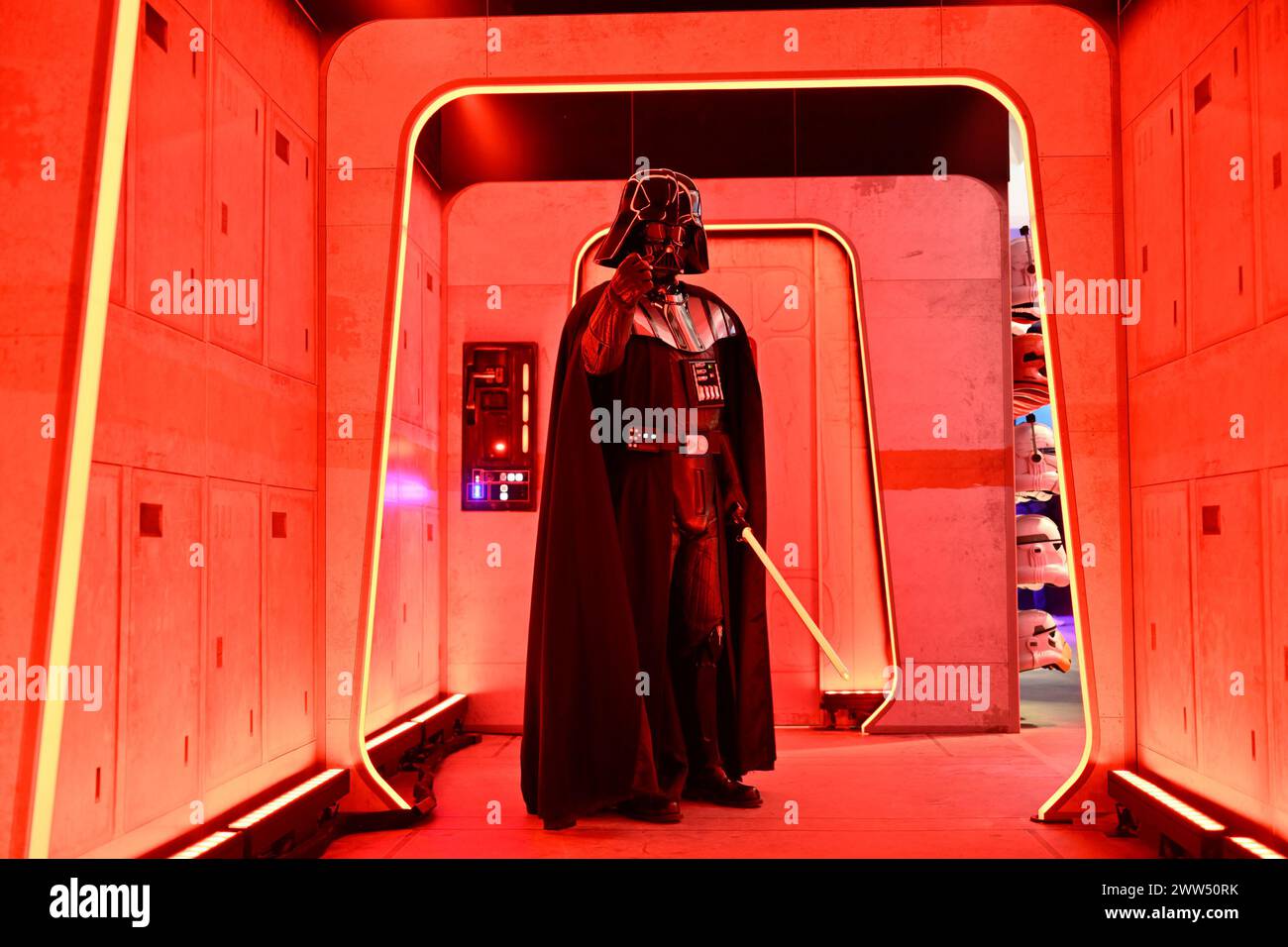 A Darth Vader costumed character poses at the Hasbro and Amazon Star ...