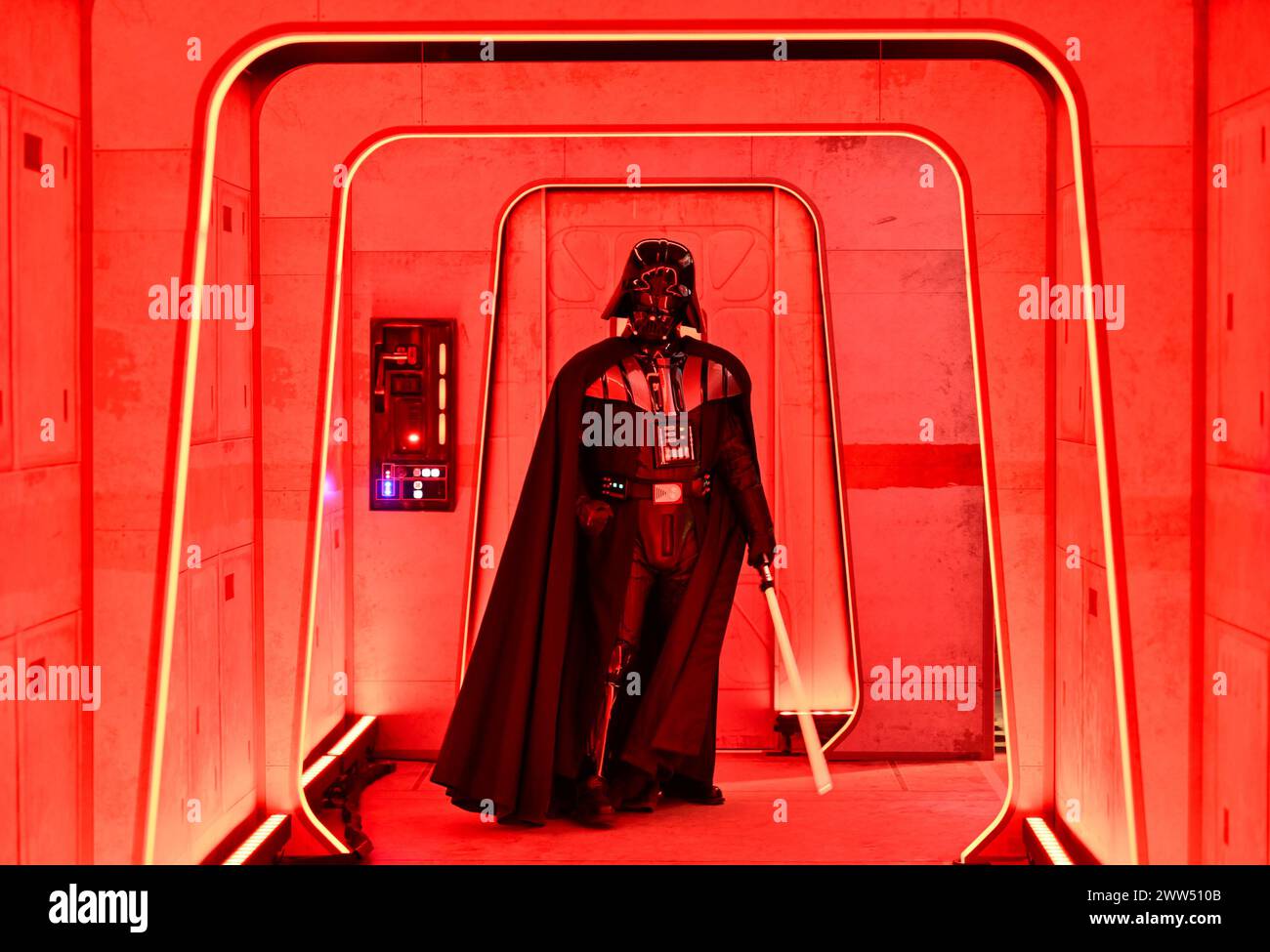 A Darth Vader costumed character poses at the Hasbro and Amazon Star ...