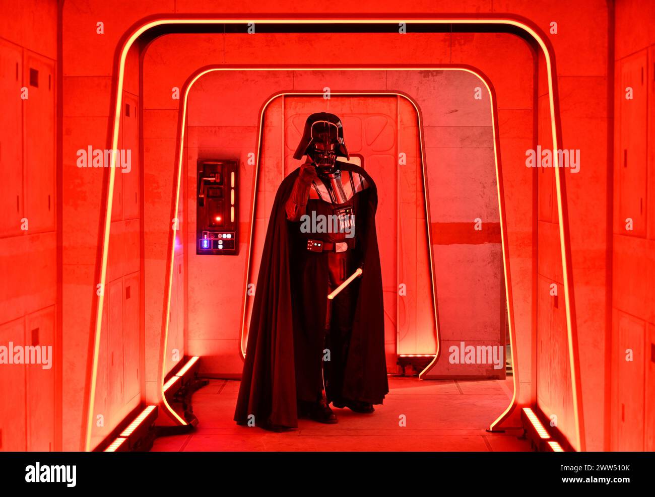 A Darth Vader costumed character poses at the Hasbro and Amazon Star ...