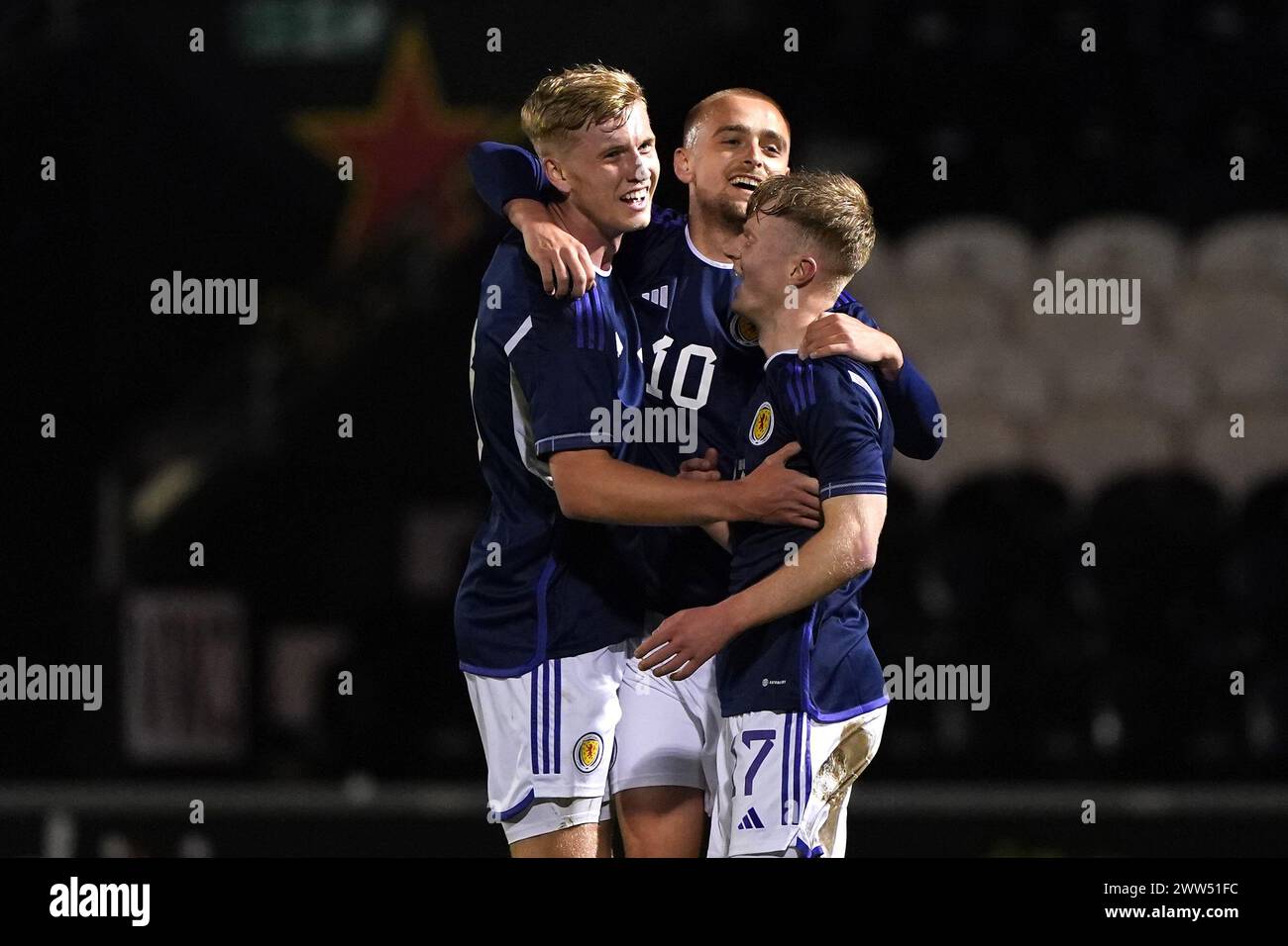 Scotland's Lyall Cameron (right) celebrates scoring their side's second ...