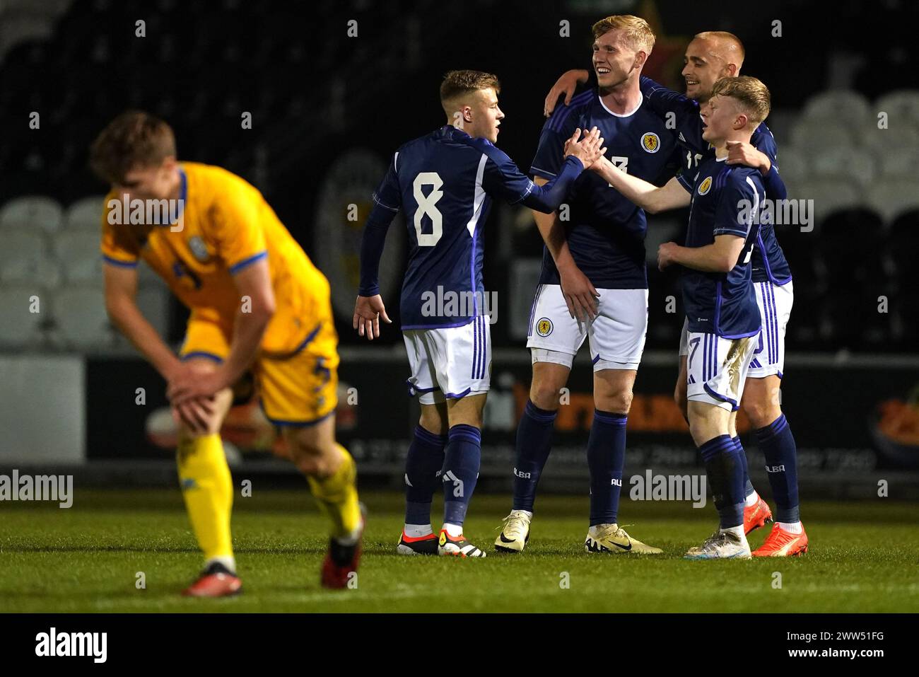 Scotland's lyall cameron (right) celebrates scoring their side's second ...