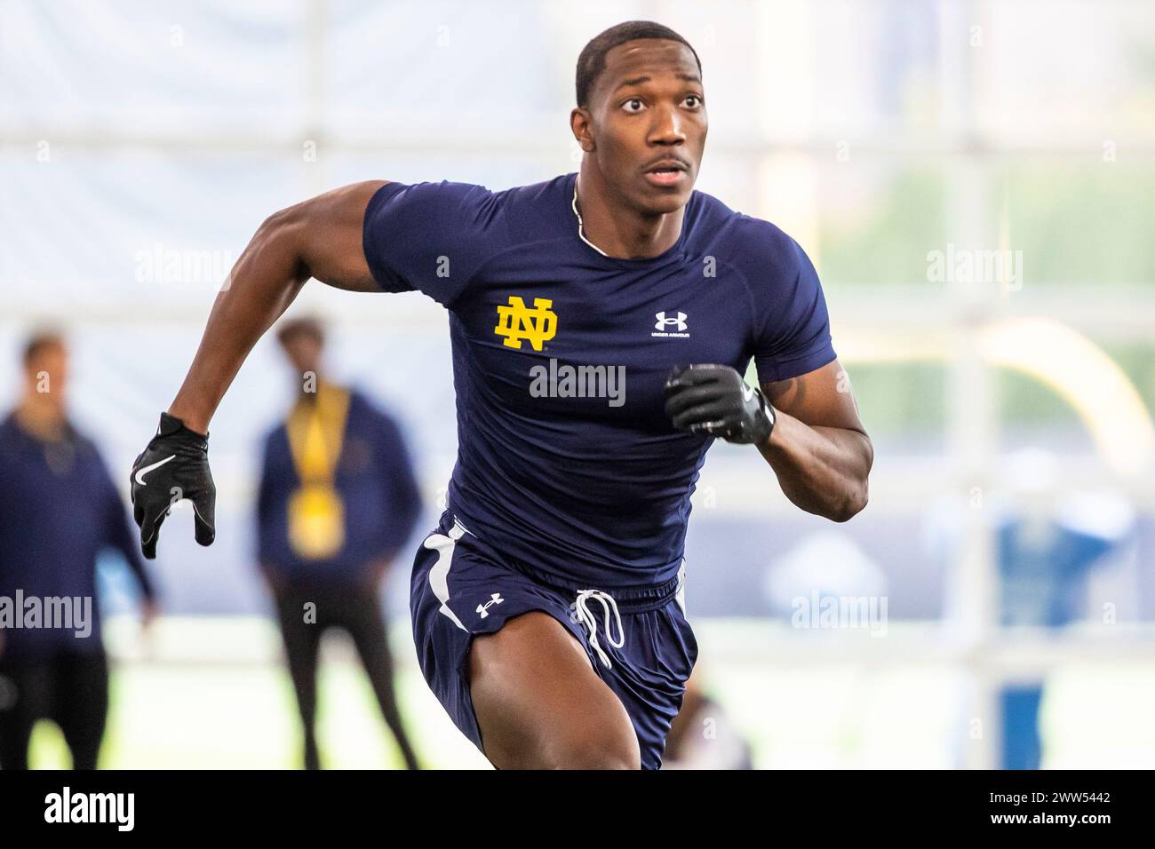 Notre Dame cornerback Cam Hart runs a drill during NFL pro day football ...