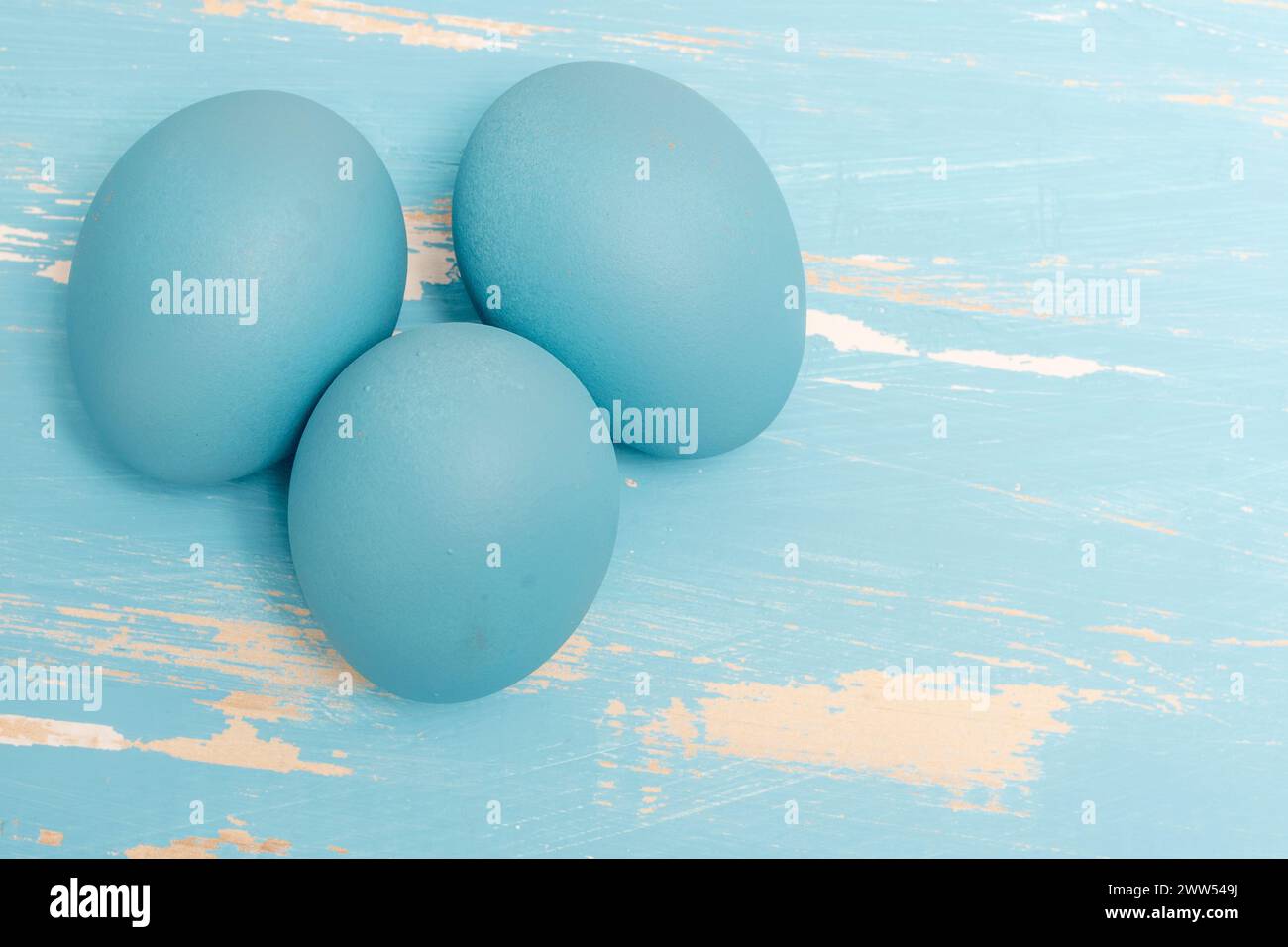 Eggs symbolizing the Easter holiday in blue color on a background of ...