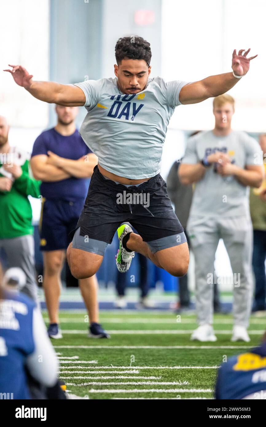 Notre Dame linebacker Paul Moala does the broad jump during NFL pro day ...