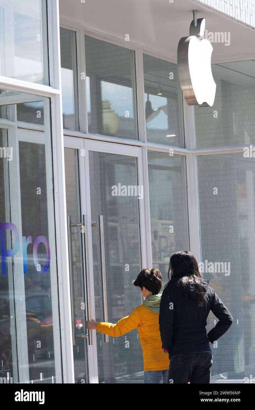 Washington, USA. 21st Mar, 2024. People enter an apple store in ...