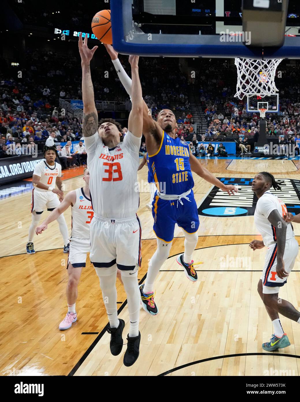 Illinois forward Coleman Hawkins (33) and Morehead State guard Kalil ...