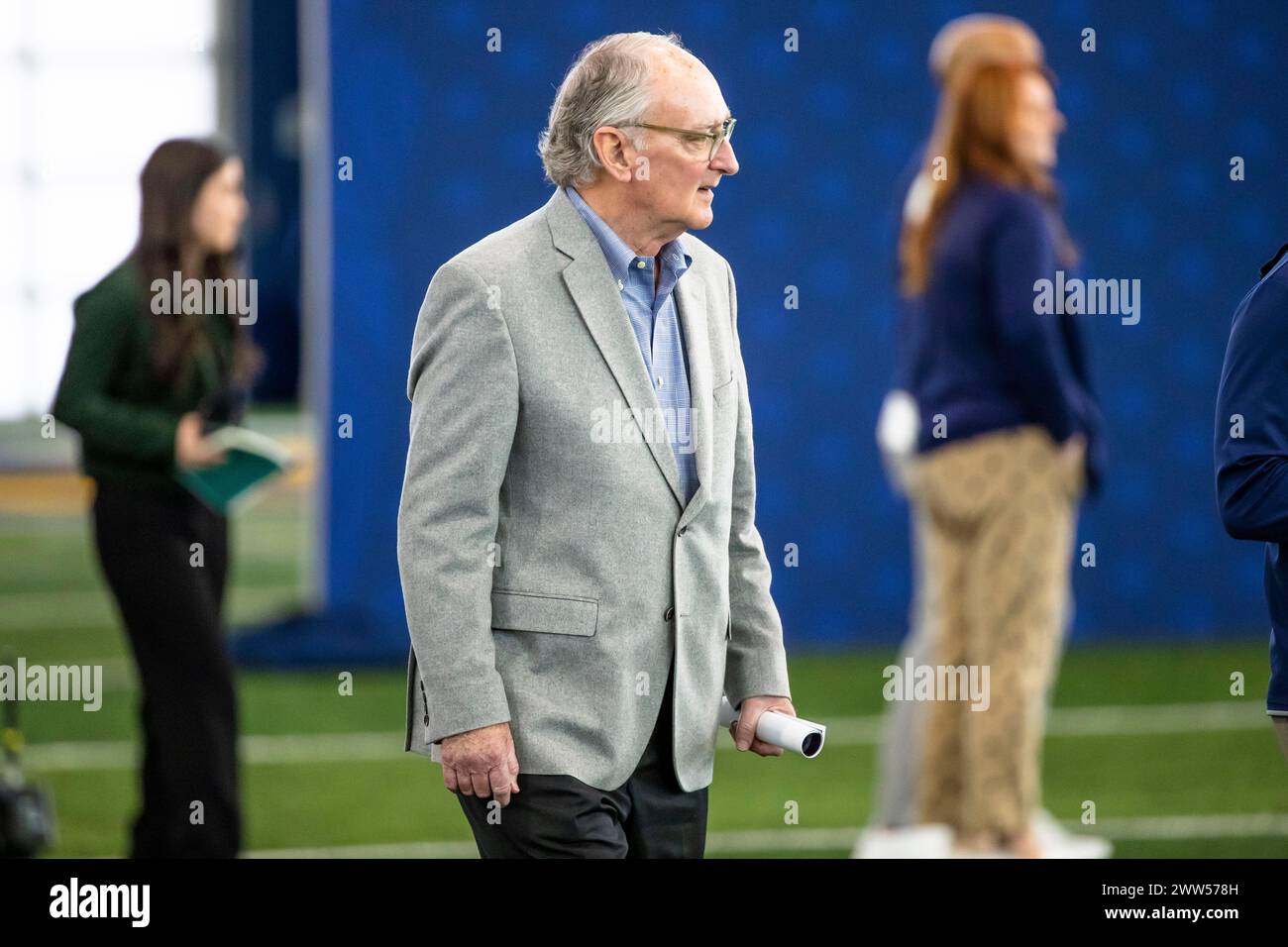 Notre Dame Athletics Director Jack Swarbrick walks onto the field ...