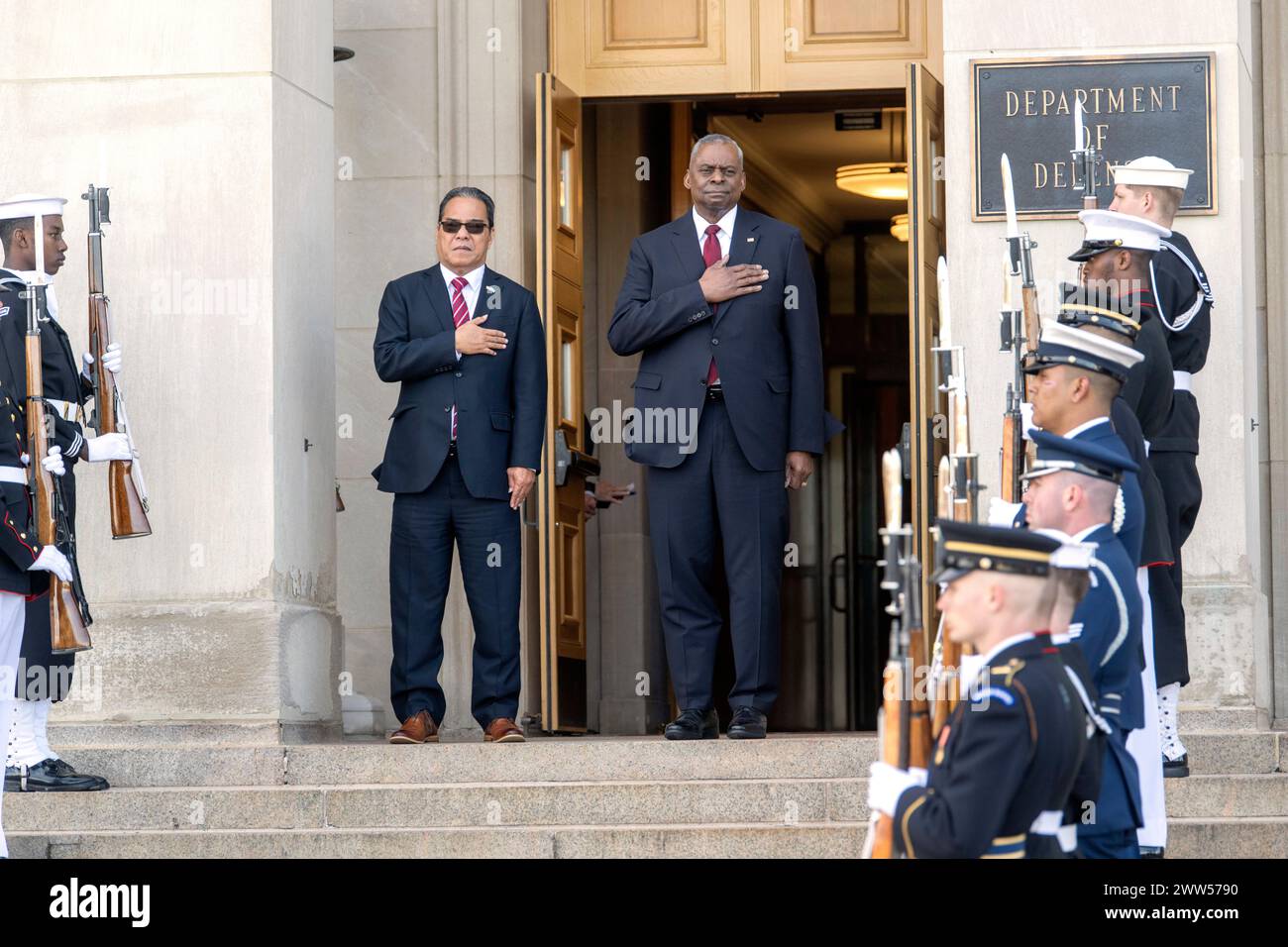 Secretary of Defense Lloyd Austin, right, welcomes President of the ...