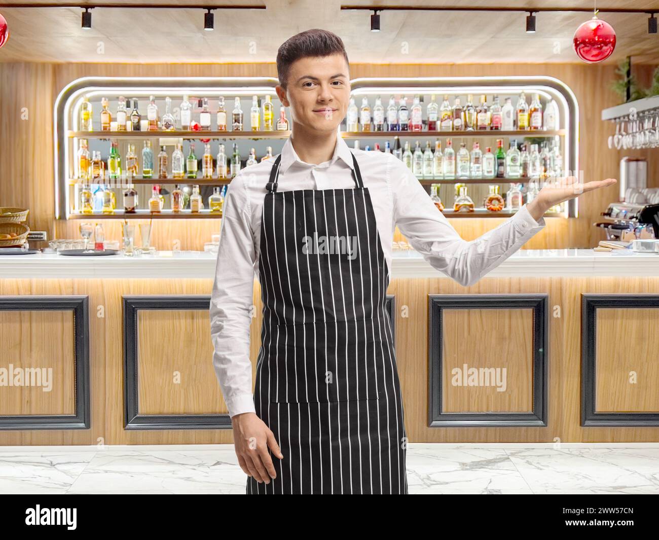 Restaurant welcome staff hi-res stock photography and images - Alamy