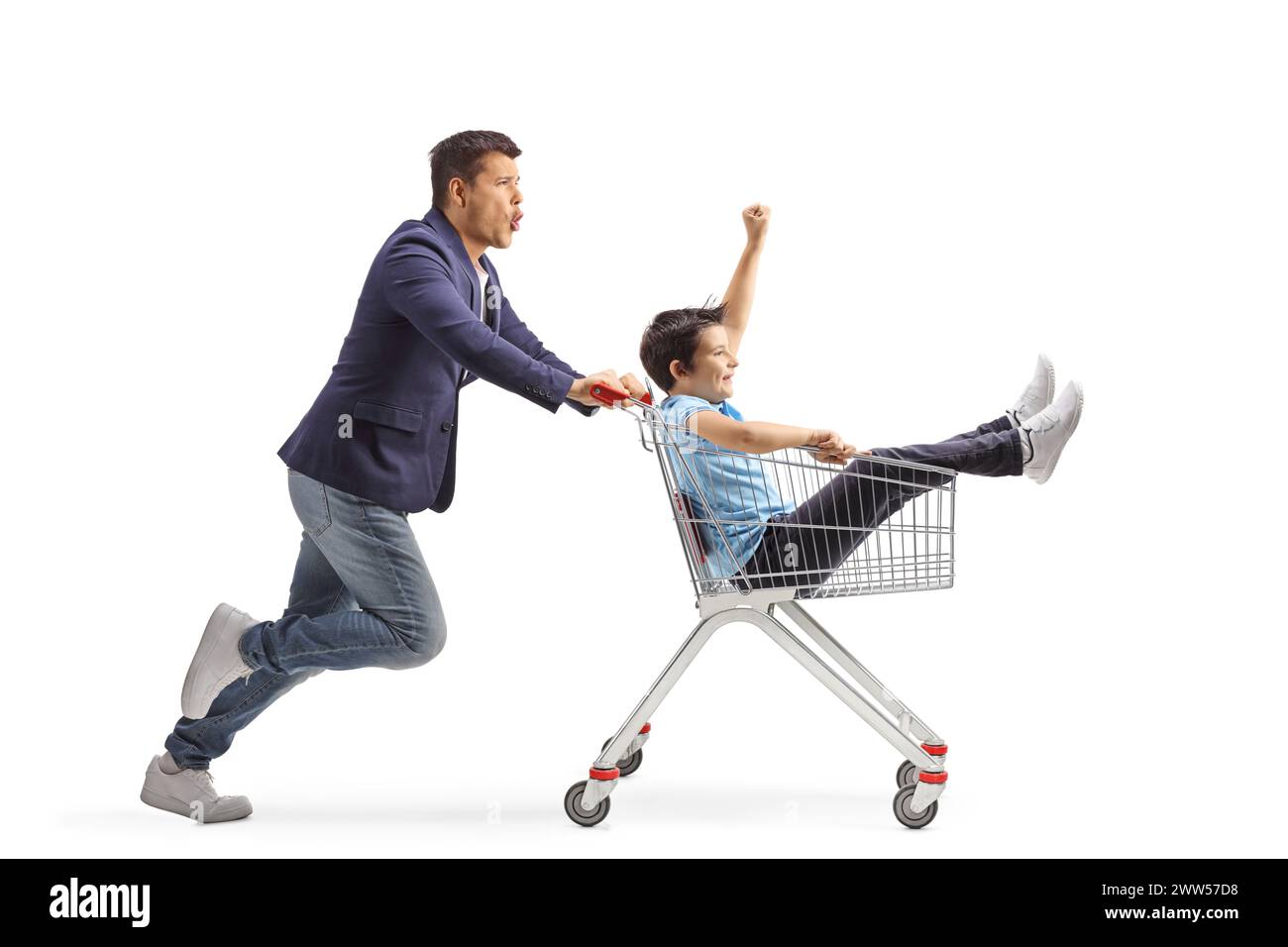 Young man pushing his kid inside a shopping cart isolated on white ...