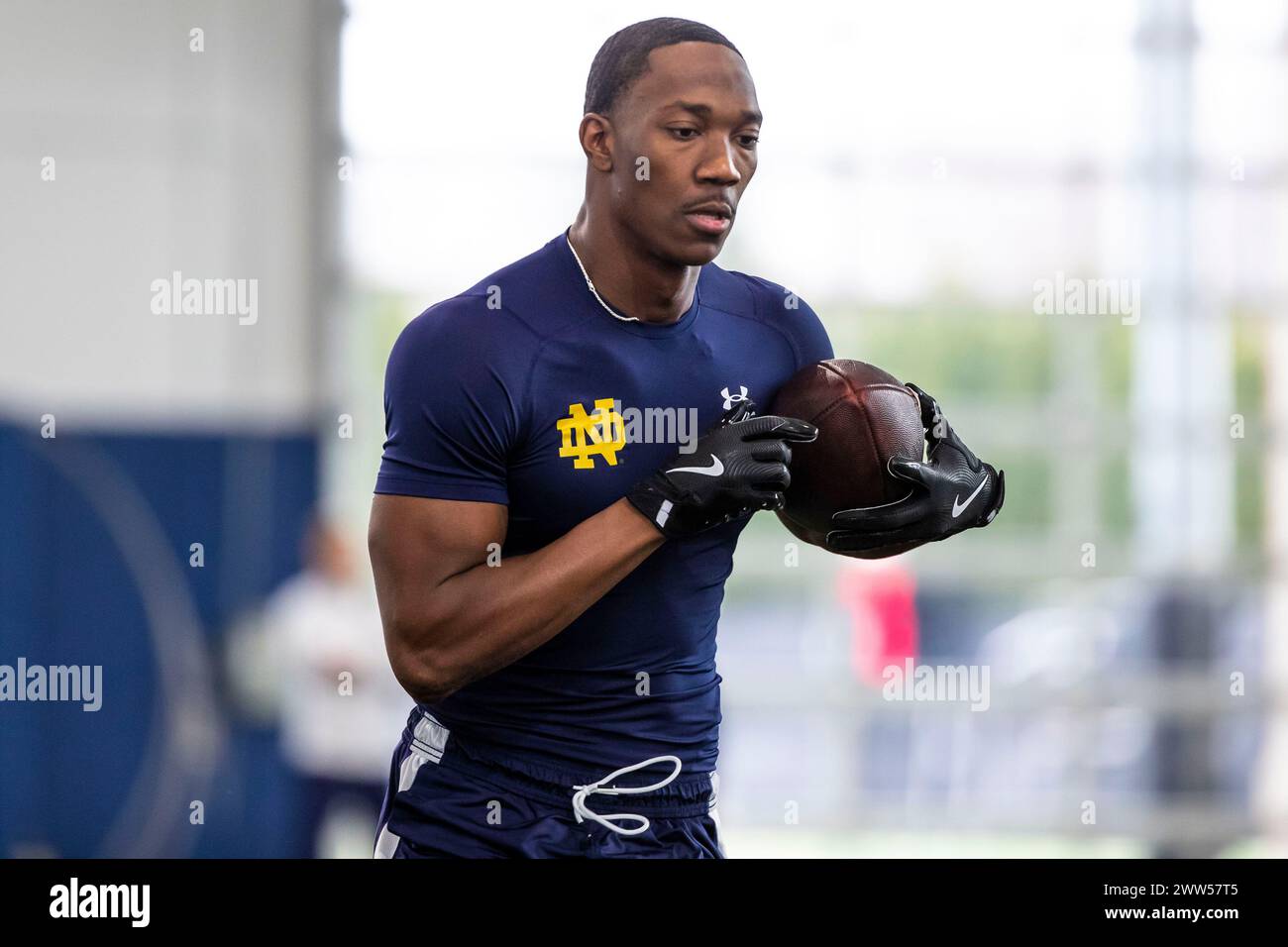 Notre Dame cornerback Cam Hart runs a drill during NFL pro day football ...