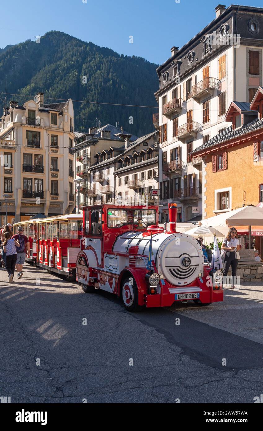 Tourist train crossing the historic district of the popular ski resort ...