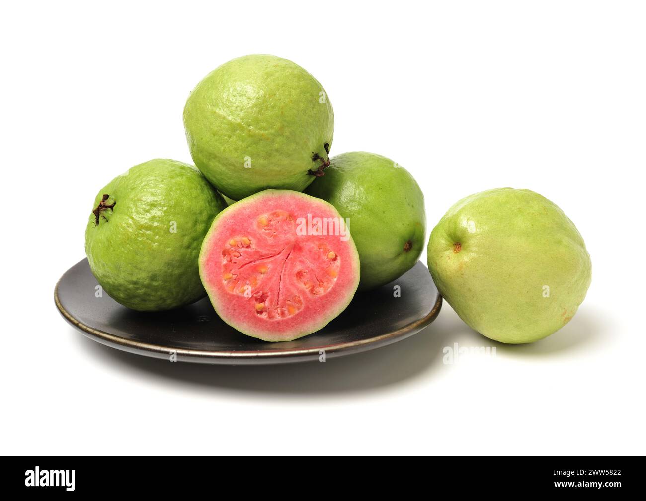 Pink guava isolated on white background Stock Photo - Alamy
