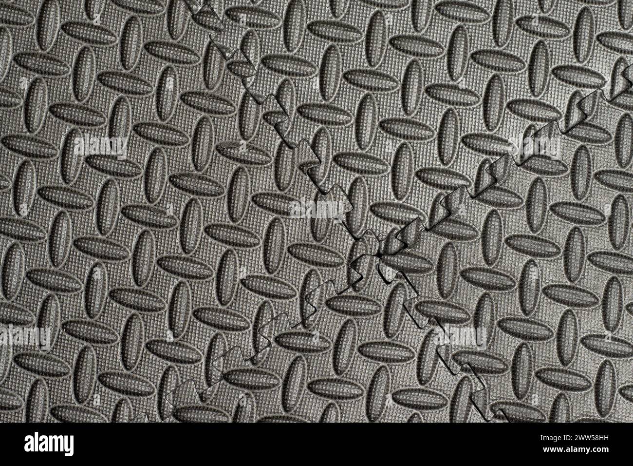 Textured tiles of a floor protection mat made of eva foam Stock Photo ...
