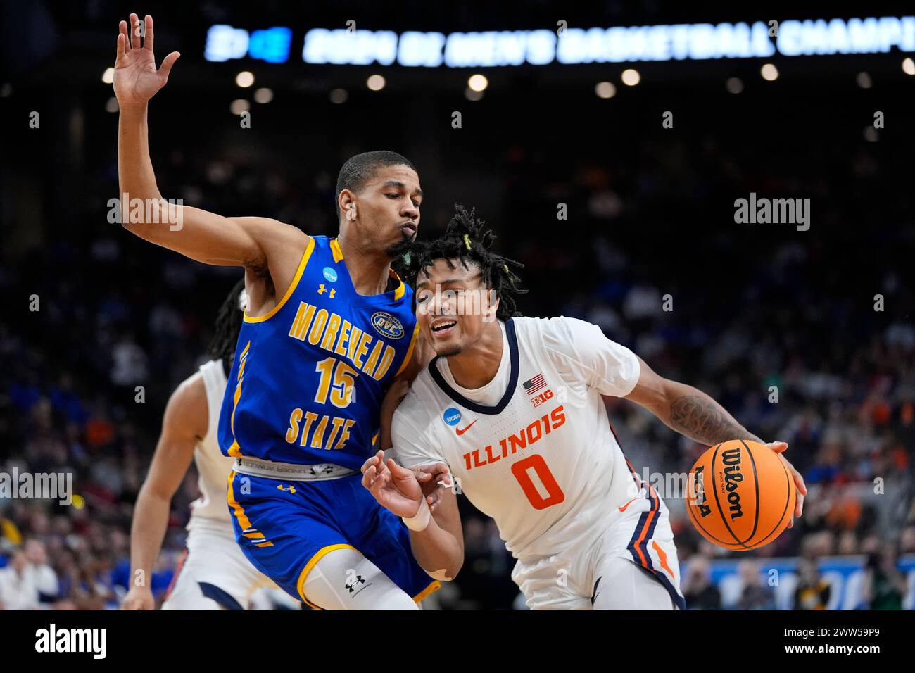 Illinois guard Terrence Shannon Jr. (0) drives on Morehead State guard ...