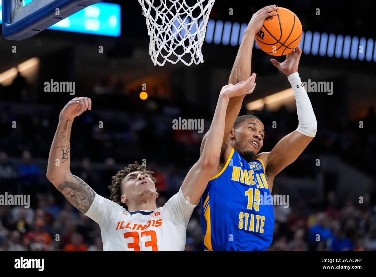 Morehead State guard Kalil Thomas (15) grabs a rebound over Illinois ...