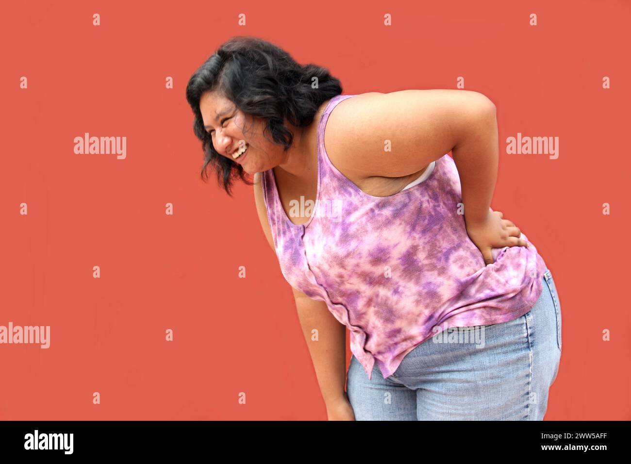 Young 20-year-old woman suffers from back pain due to damage to the ...