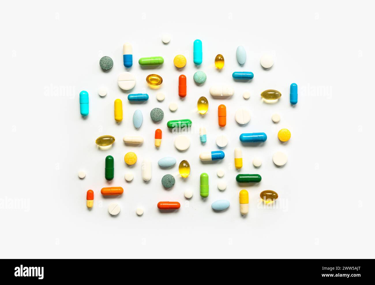 Fish oil capsules and different pills on white background Stock Photo ...