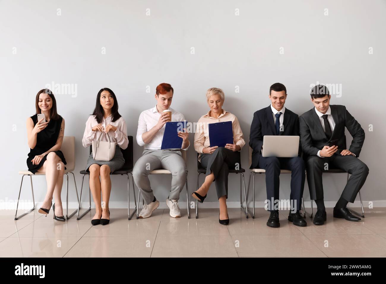 Applicants waiting job interview hi-res stock photography and images ...