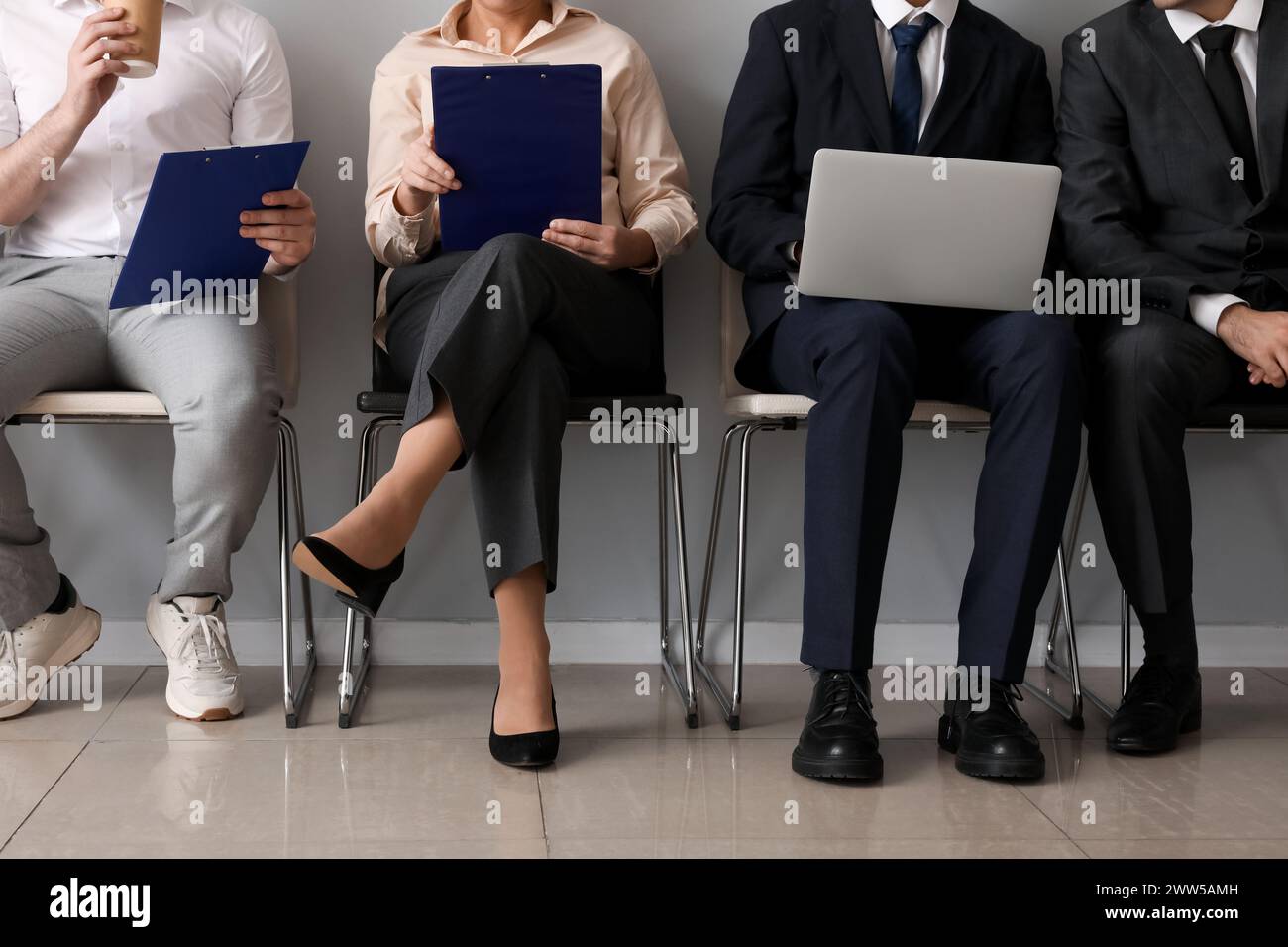 Applicants waiting for job interview in room Stock Photo - Alamy